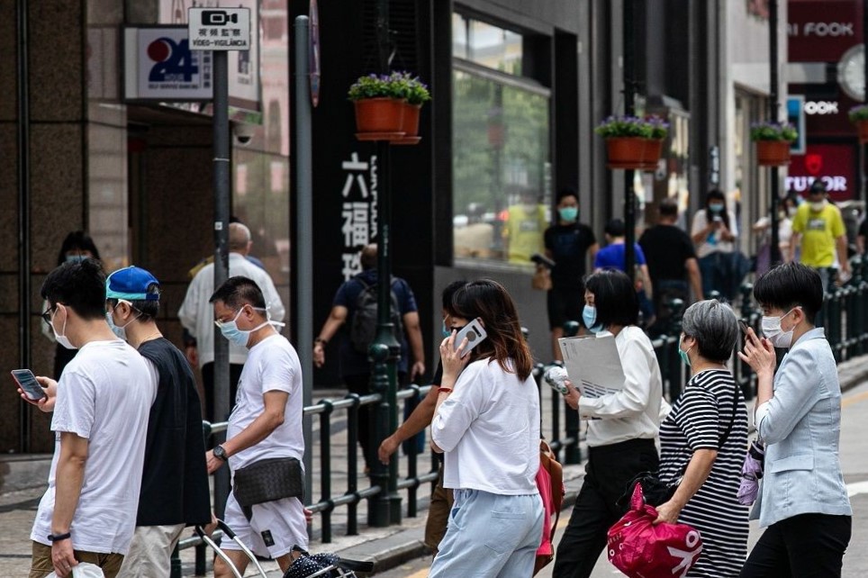 Macau workers more confident in job market, but less satisfied overall ...